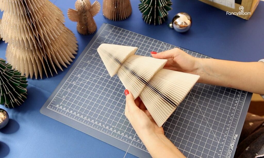 How To Make A Christmas Tree Out Of Paper (DIY West Elm Dupe) - FancyBloom