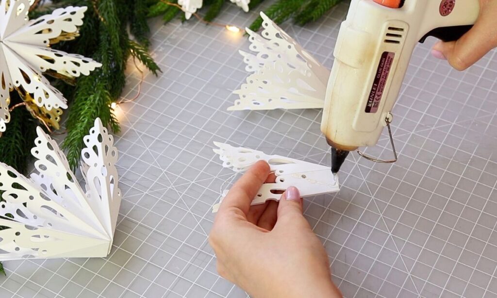 How To Make A 3D Paper Snowflake Ornament: Easy West Elm Dupe! - FancyBloom