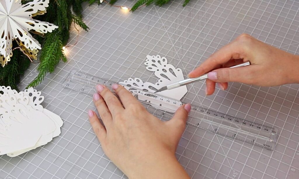 How To Make A 3D Paper Snowflake Ornament: Easy West Elm Dupe! - FancyBloom
