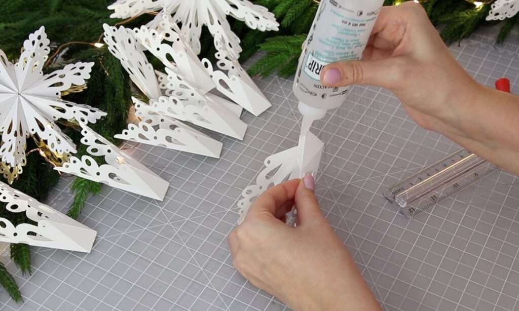 How To Make A 3D Paper Snowflake Ornament: Easy West Elm Dupe! - FancyBloom